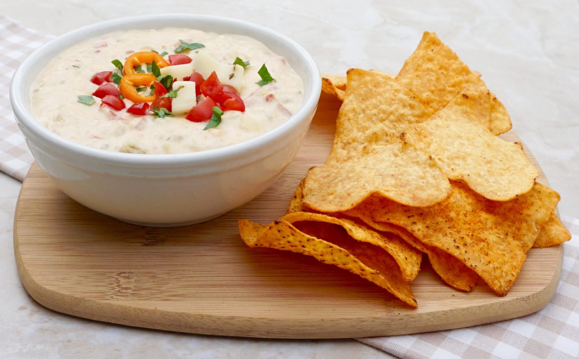 Queso Dip is a smooth, creamy cheese dip with Mexican spices.